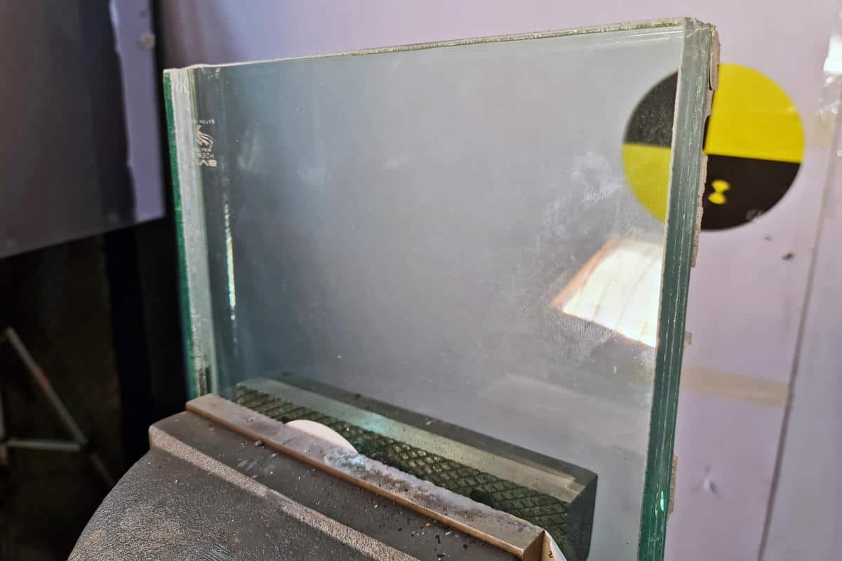 See exactly how B6-rated ballistic glass stops a bullet